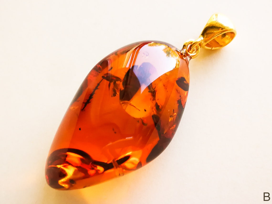 Natural amber twisted unique shape pendant bright clear | Etsy