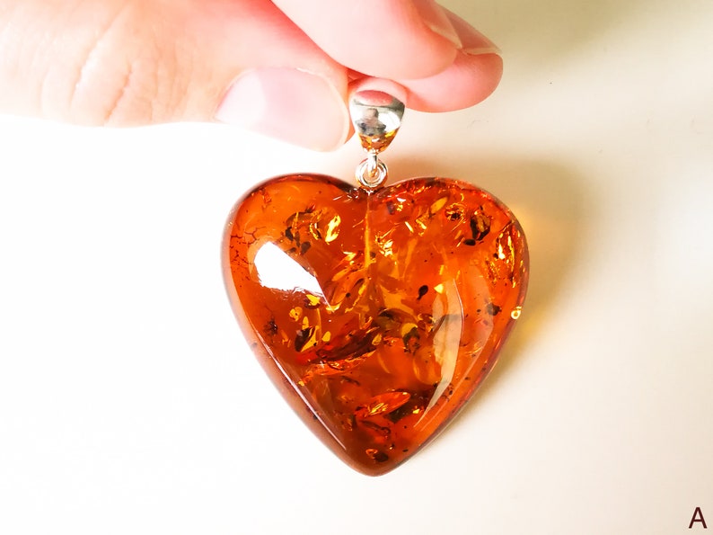 Natural amber shiny light cherry color heart shaped pendant | Etsy