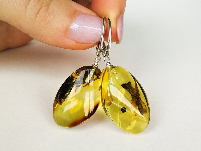 Natural amber light green color medium size twisted oval shape | Etsy