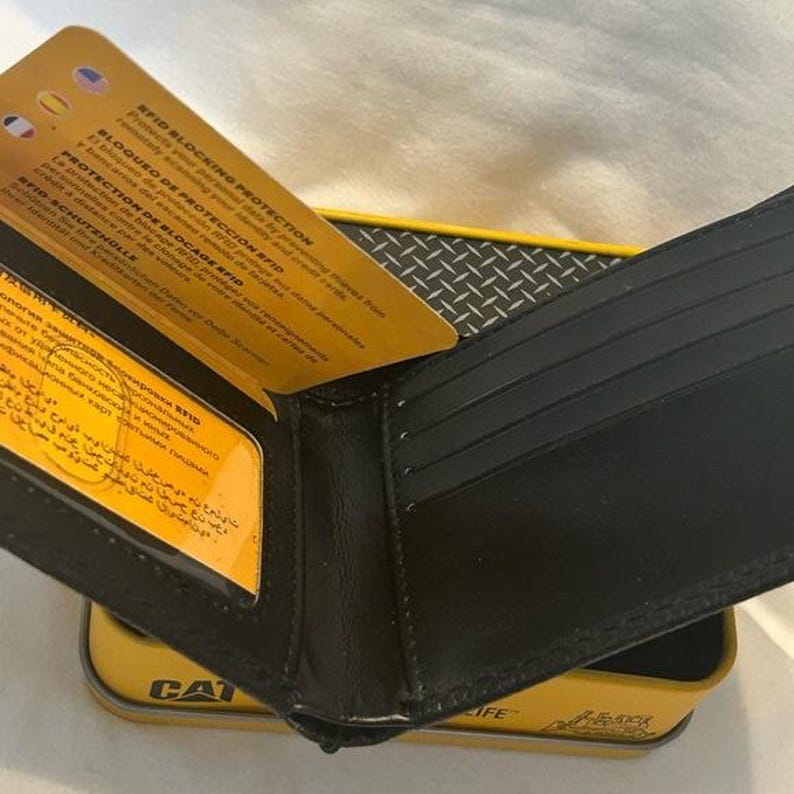 CAT Caterpillar Men’s Black Leather Bifold Wallet With RFID Shield ...