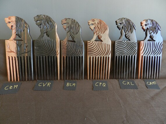 African lion hippo comb in ebony wood, chameleon comb… - Gem