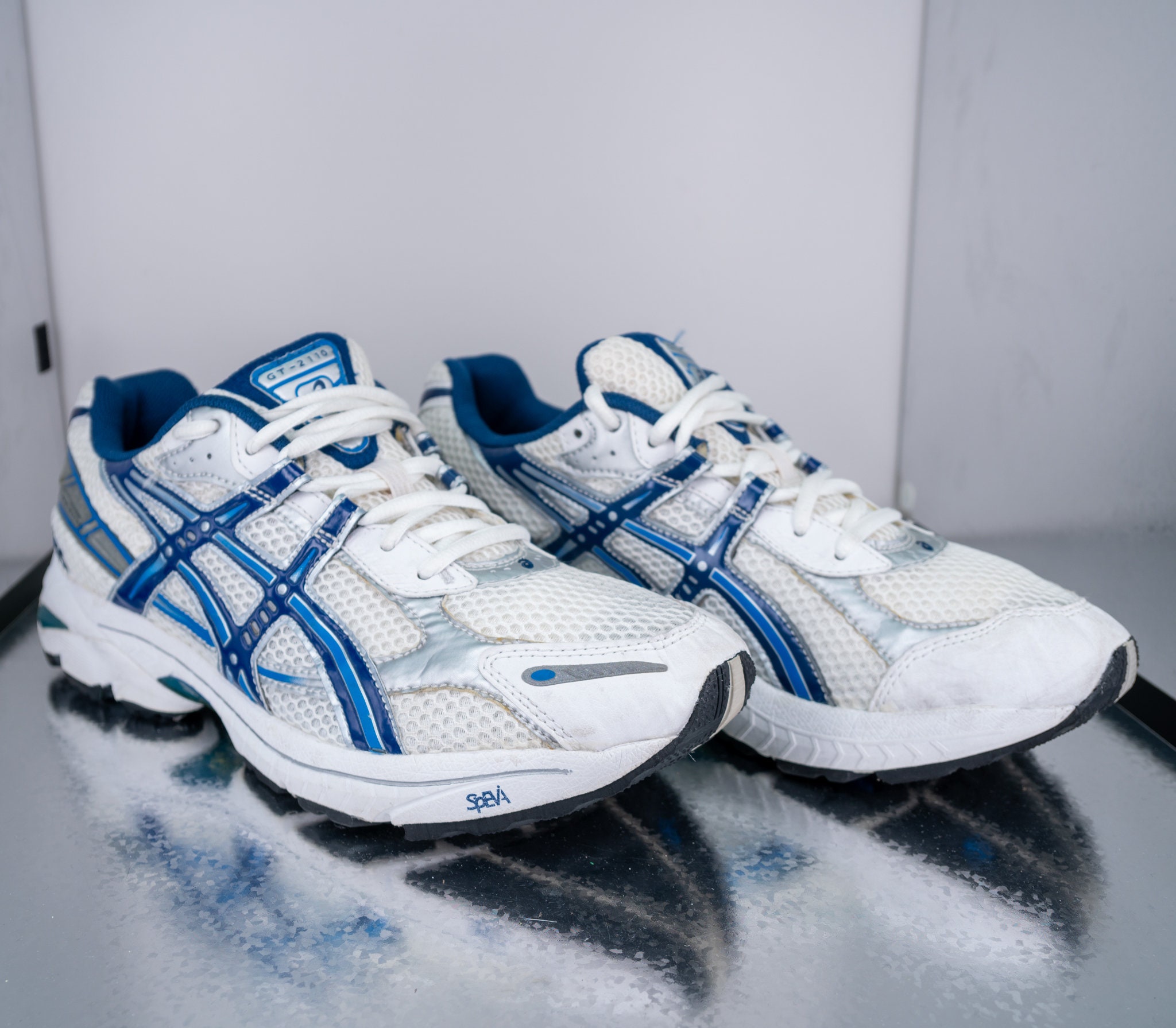 Asics 2110 store