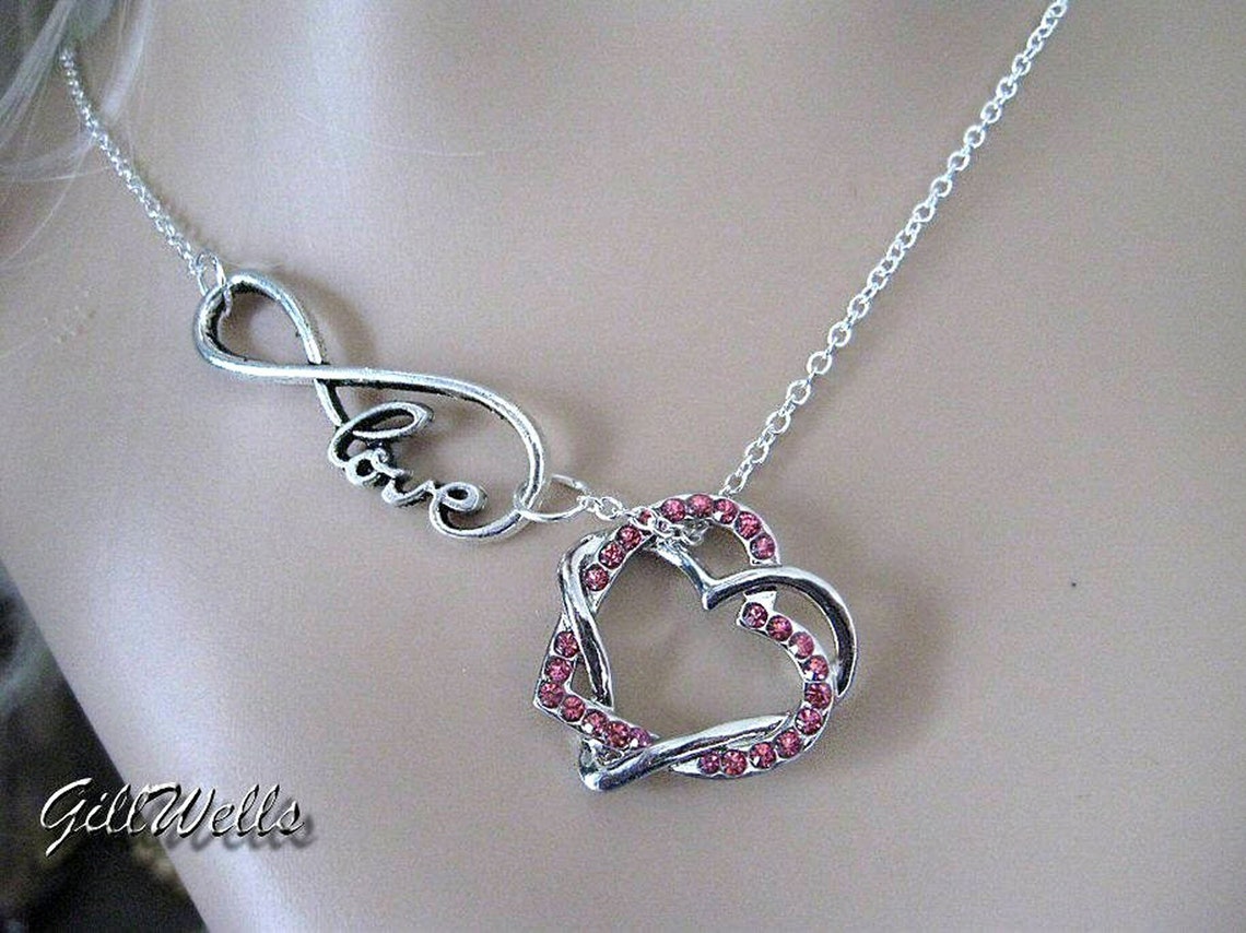 Love infinity necklace with hearts entwined in crystal color | Etsy