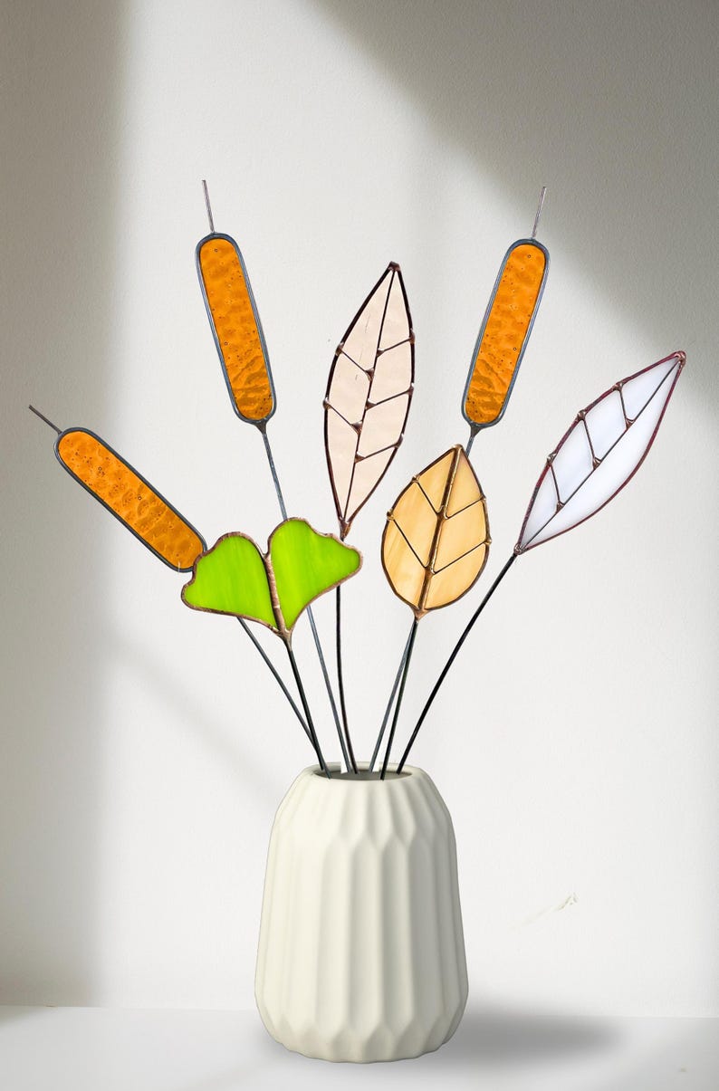 Set di tife in vetro colorato ambrato: decorazioni floreali fatte a ...