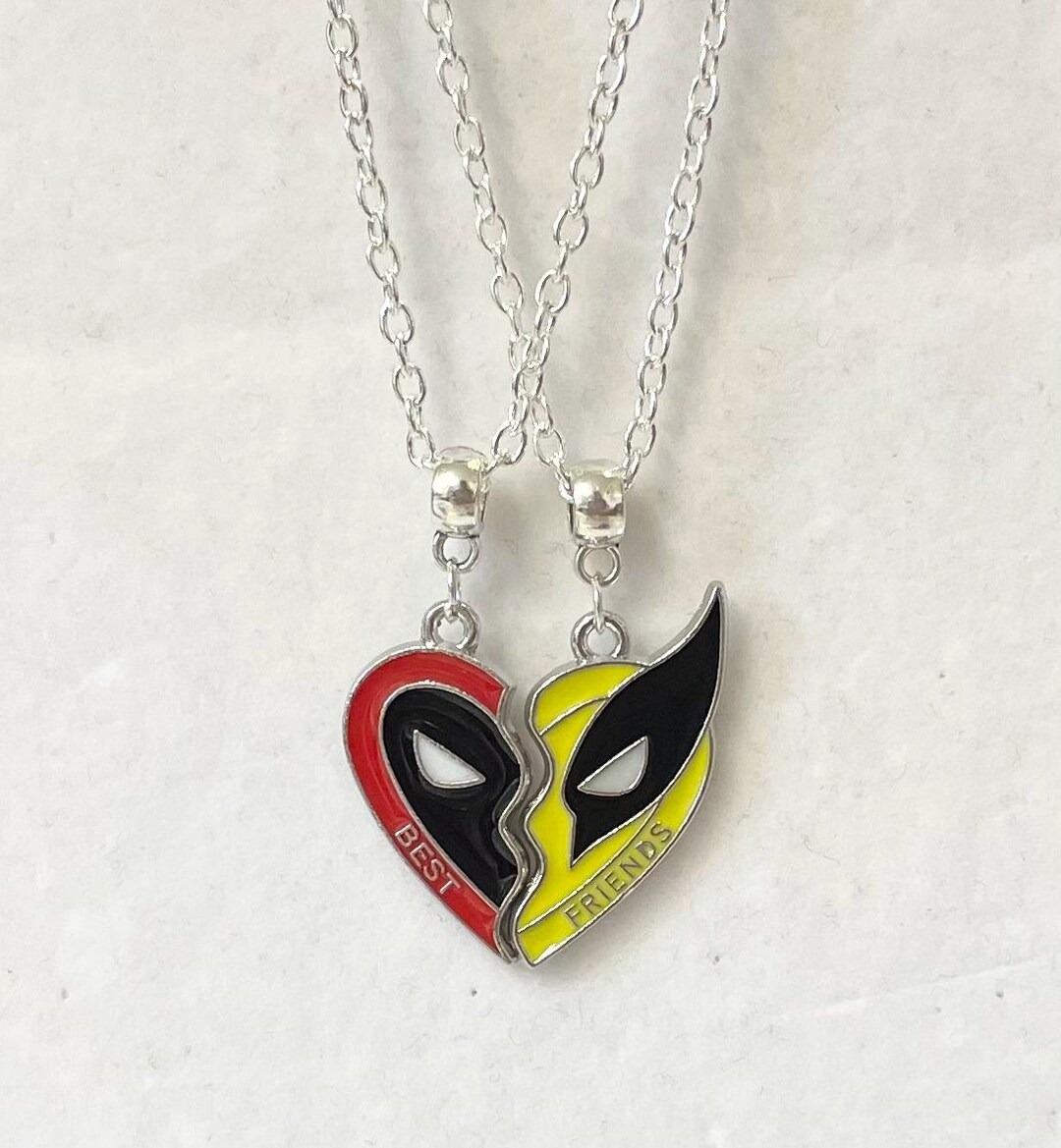 Deadpool and Wolverine Inspired Pair of Pendants on a Silver Plated ...