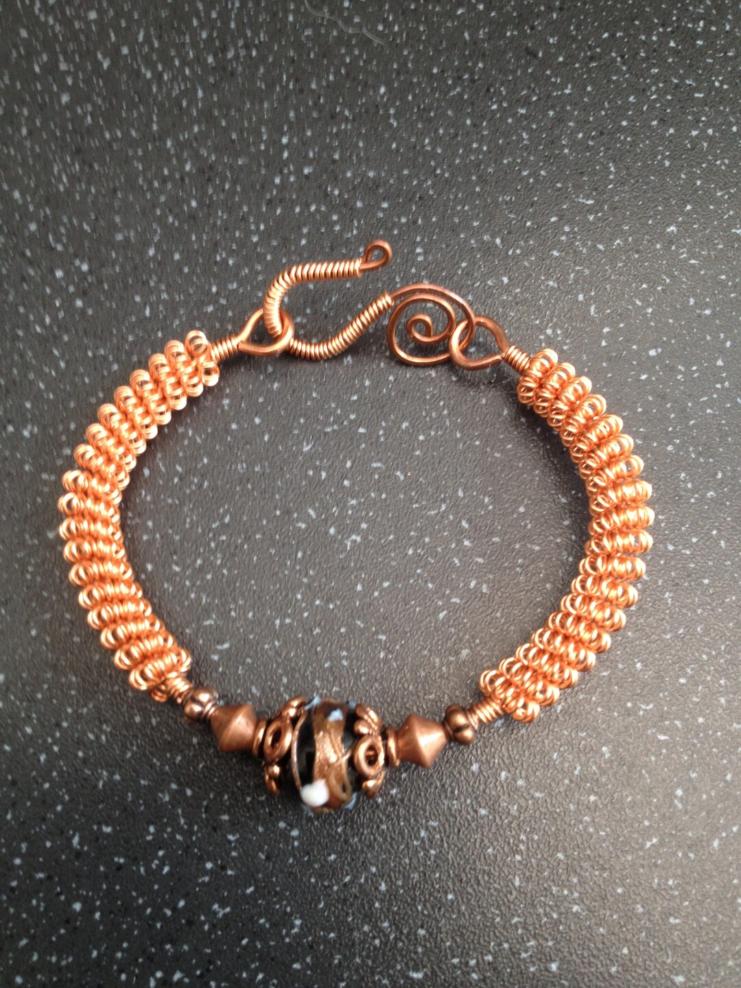 Copper wirework bracelet, with black and copper lampwork focal bead ...