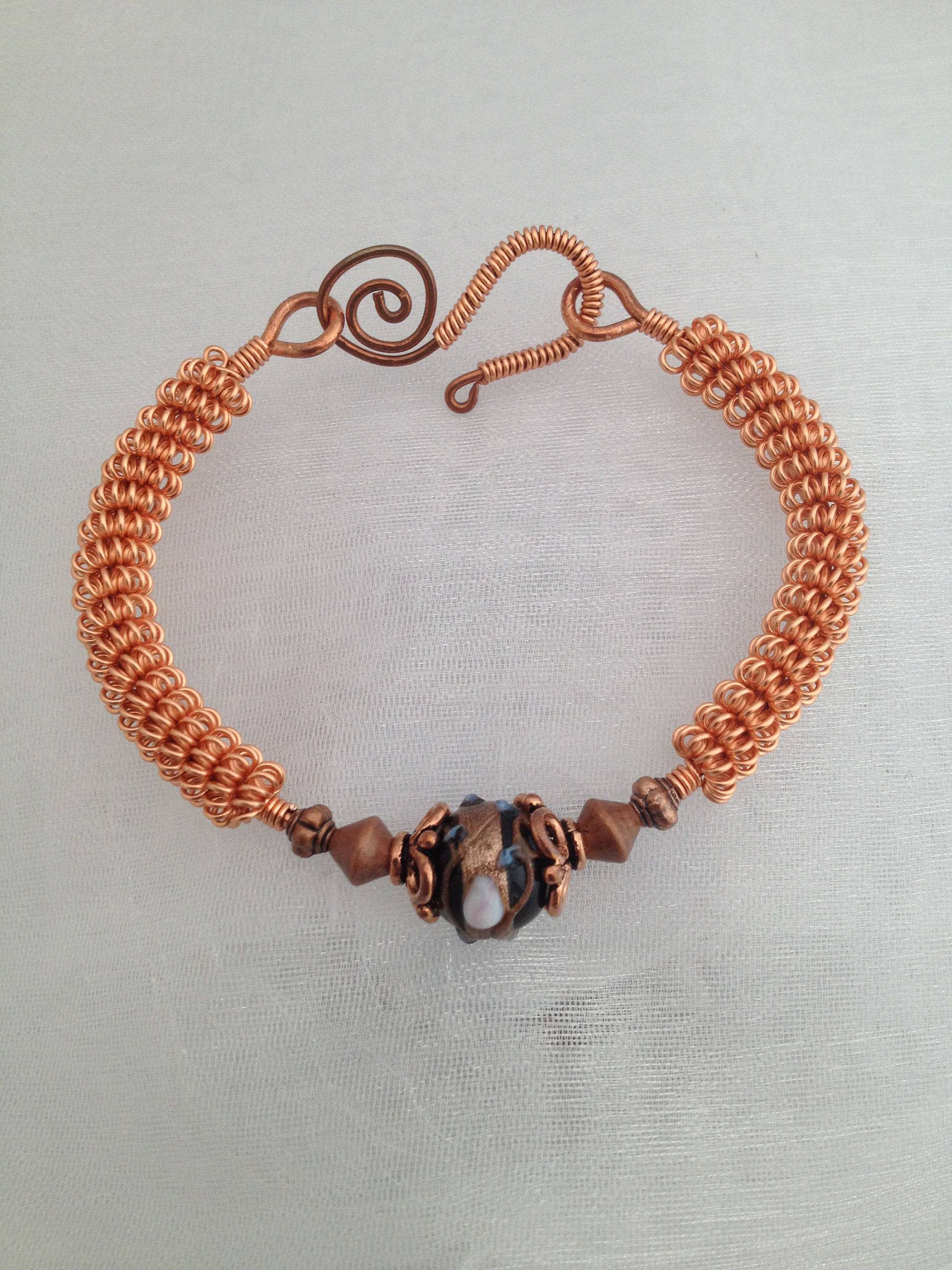 Copper wirework bracelet, with black and copper lampwork focal bead ...