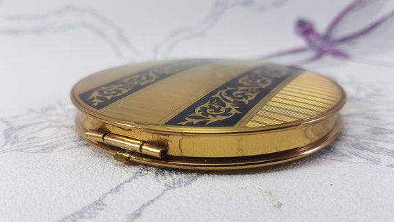 Vintage Stratton gold and black powder compact, Strat… - Gem