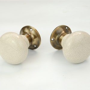 Jones & Grey Cream Ceramic Crackle Glaze Round Door Knobs Mortice Handles Antique Brass - Etsy UK
