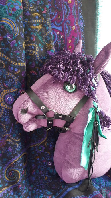 Purple Hobby Horse With Turquoise Eyes and a Curly Mane Made of Thick ...