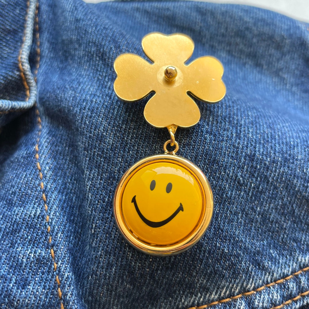 Moschino 1990's Funky Four-leaf Clover Grigri Brooch and Smiley Charm ...