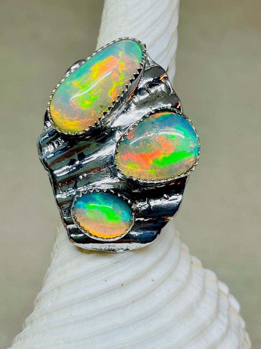 3 Luminescent Ethiopian Opals Are Artfully Displayed on a Partial ...