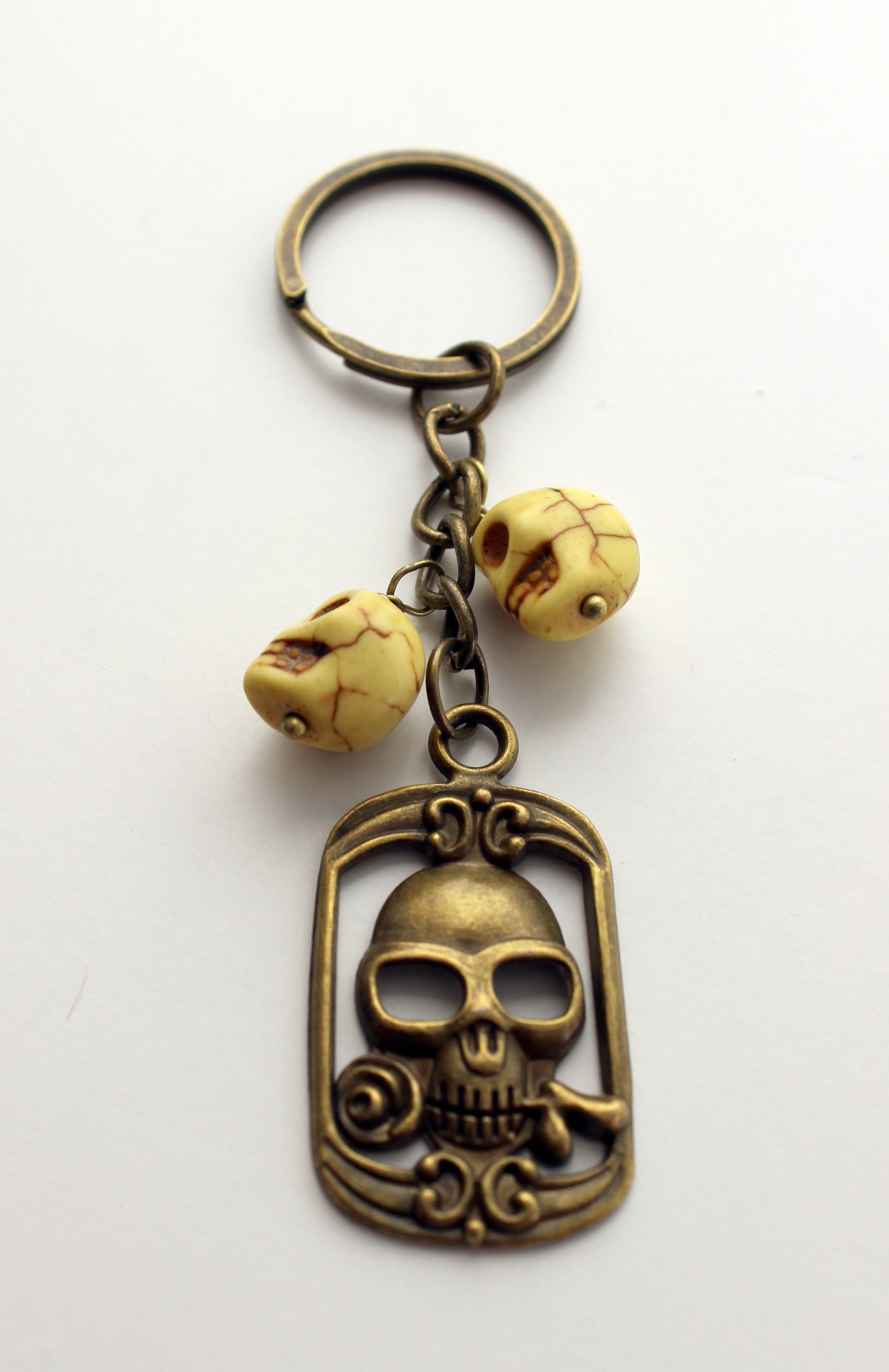 Handmade Keychain. Skull Bronze Pendant and Skull Shape Yellow Color ...