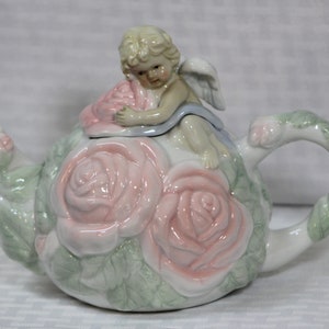 Avon Porcelain Angel Teapot, Decorated With Pink Roses in Relief ...