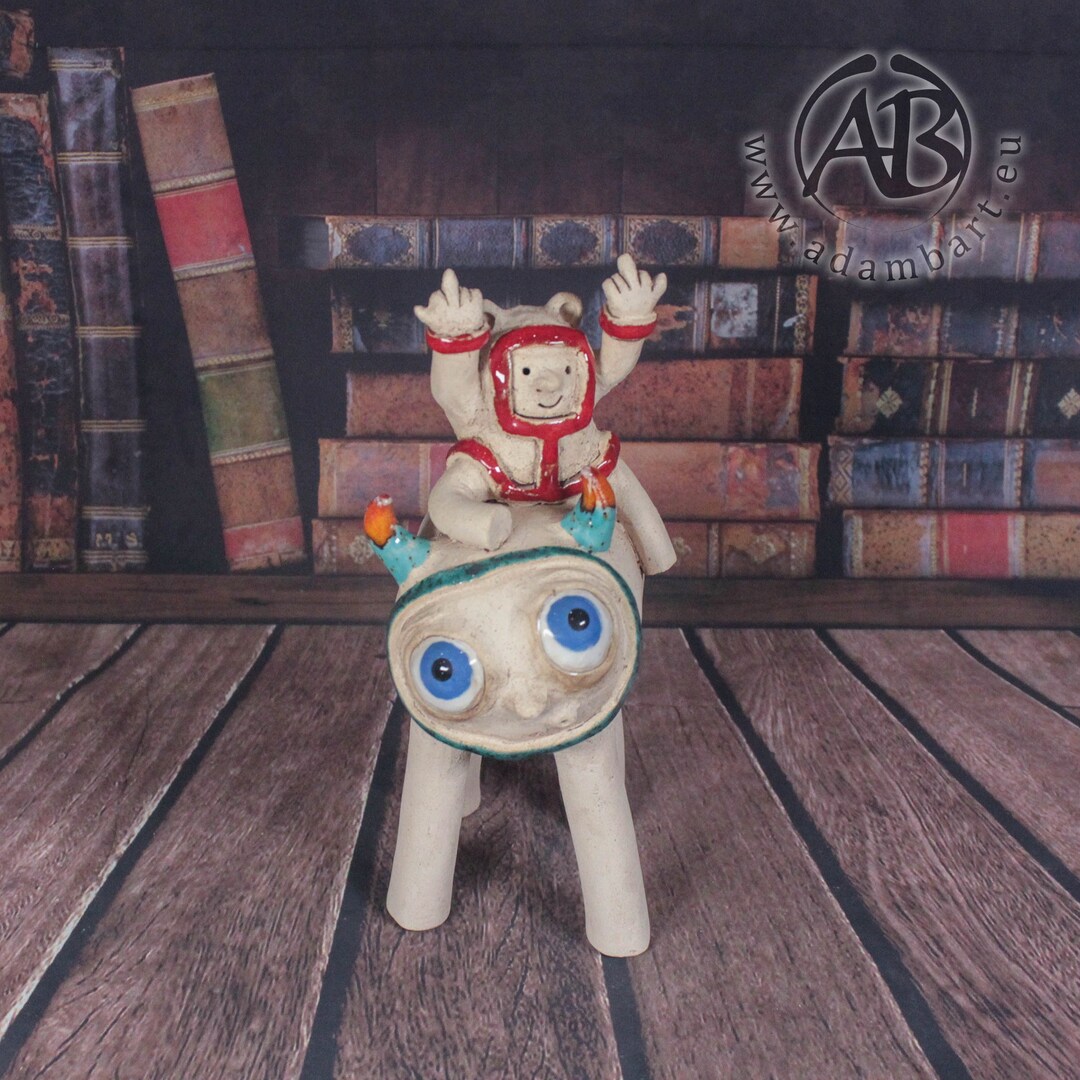 Rude Gnoo-mee Kid Riding on Pufee Monster. Funny Ceramic Sculpture ...