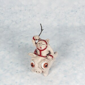 Gnoo-mee Kid Riding on a Pig. Fun Ceramic Figurine of a Playing Gnome ...
