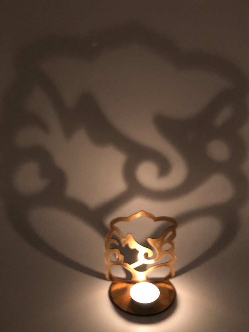 Arihant Creations Ganesha shadow diya tealight candle | Etsy