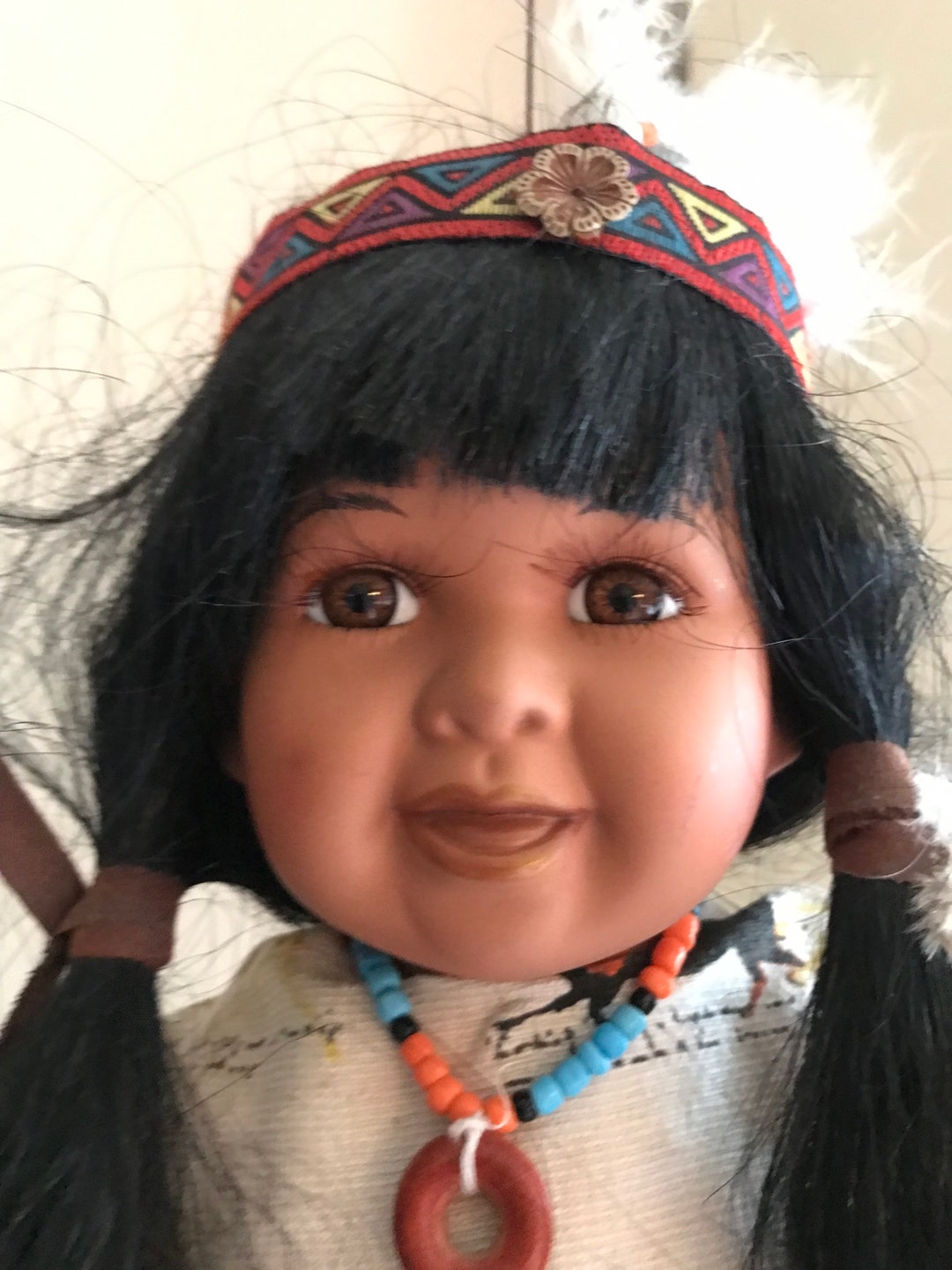 Cathay Collection Porcelain Native American Doll on a Swing, One of ...