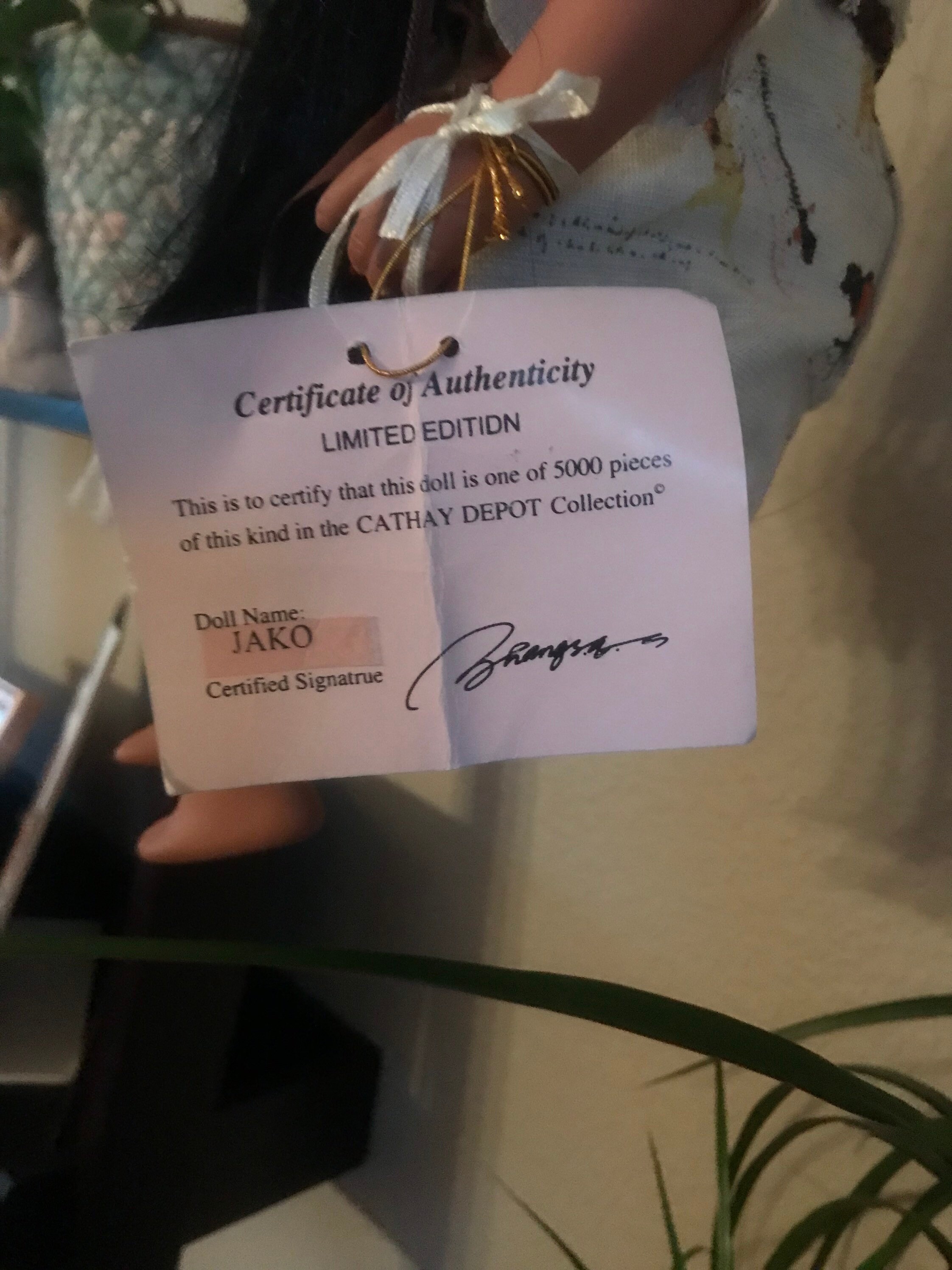 Cathay Collection Porcelain Native American Doll on a Swing, One of ...