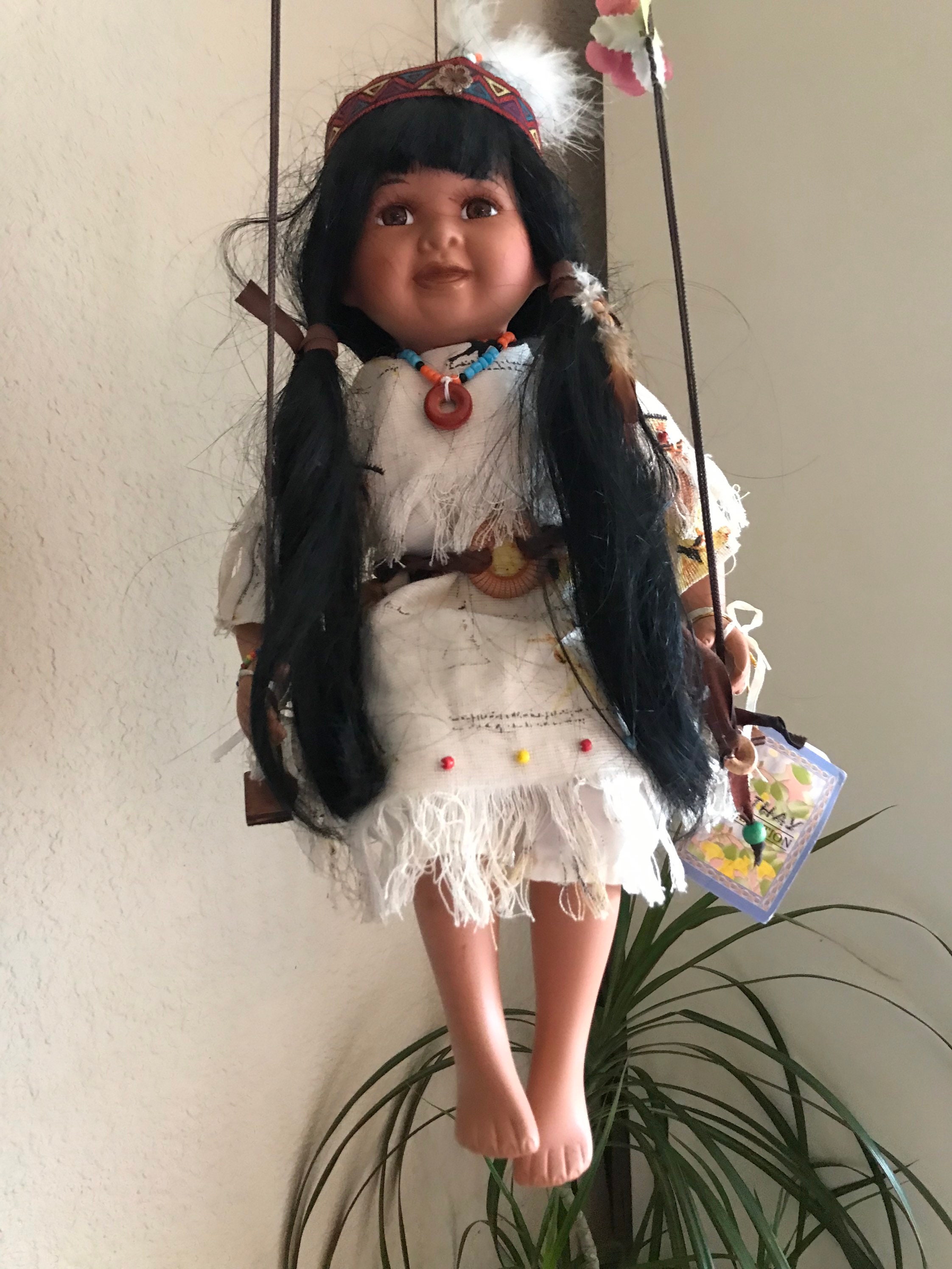 Cathay Collection Porcelain Native American Doll on a Swing, One of ...