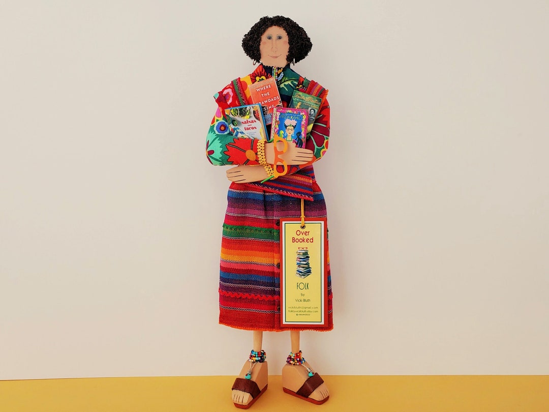 OVERBOOKED Reader Holding Four Favorite Books and Eyeglasses (southwest ...