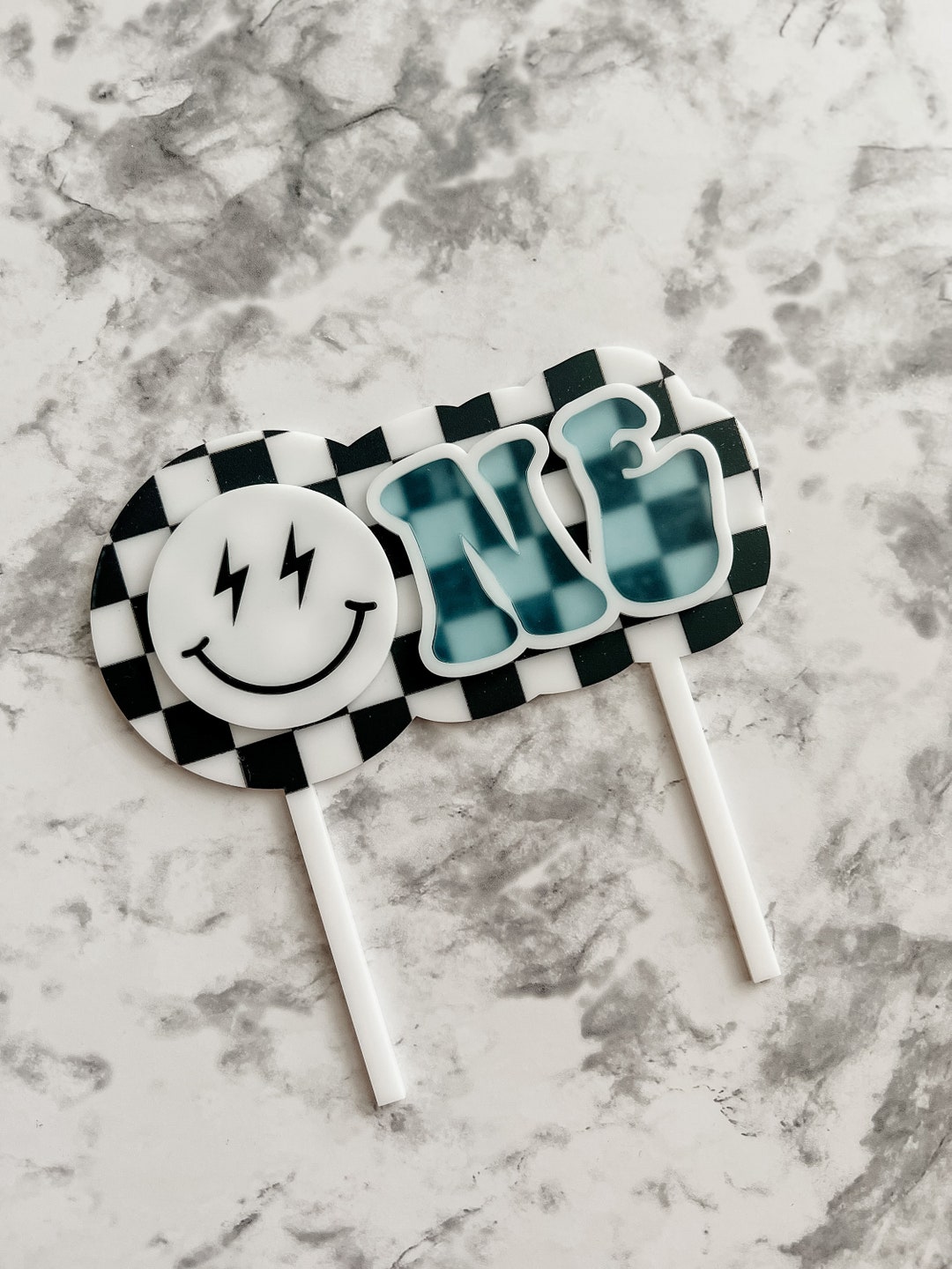 Black Checker Blue Text Smiley One Topper Lightening Bolt Eye Smiley ...