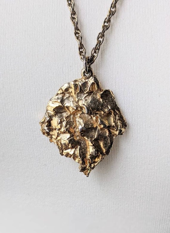 Gold coloured brutalist style rock chain pendant | Am… - Gem