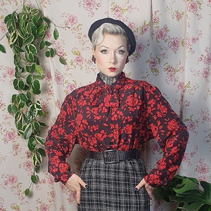 black and red patterned blouse