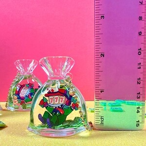 Duck Shuffler Liquid Money Bag Charm - Toontown Corporate Clash ...