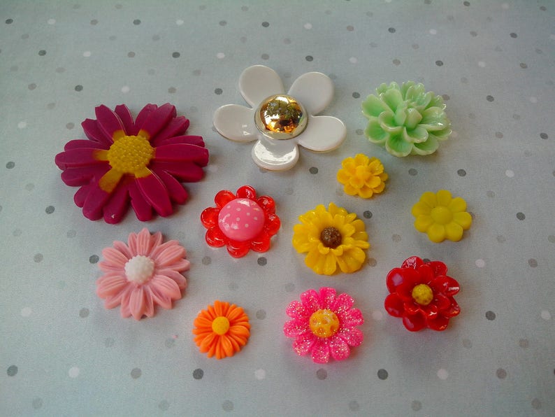 Silicone Molds in the Form of Flowers of Various Shapes and Sizes, as ...