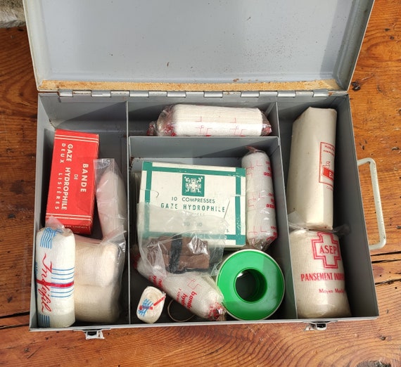 old first aid kit with old pharmacy products. - Gem