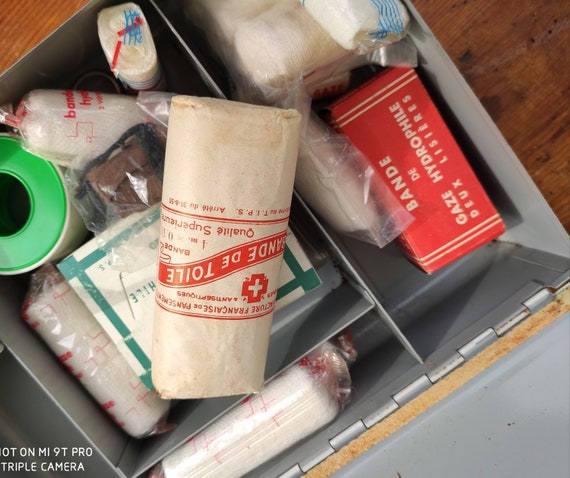 old first aid kit with old pharmacy products. - Gem