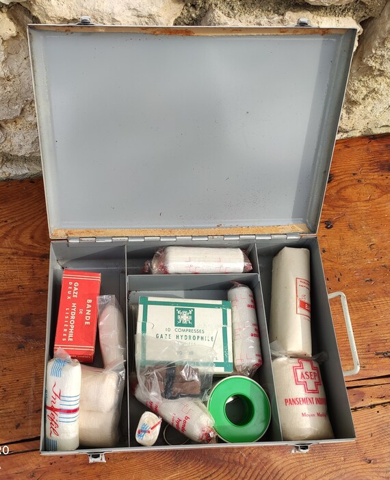 old first aid kit with old pharmacy products. - Gem