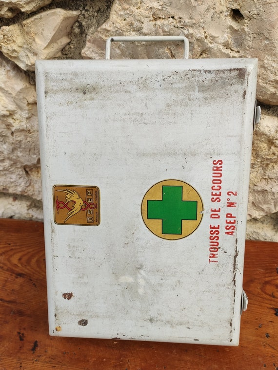 old first aid kit with old pharmacy products. - Gem