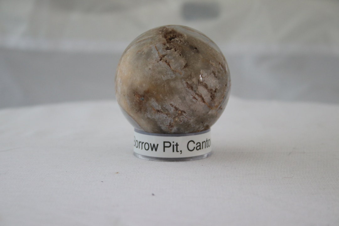 Sphere Made From the borrow Pit in Missouri. Shows Several Vugs. Keokuk ...