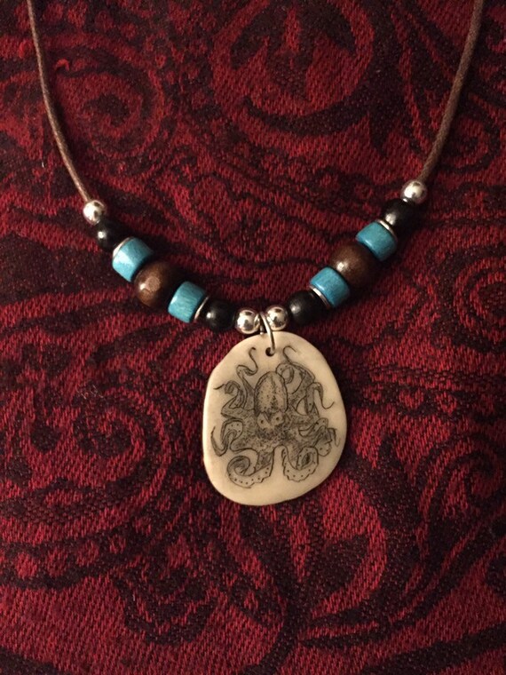 Octopus scrimshaw tagua nut slice necklace organic pendant | Etsy