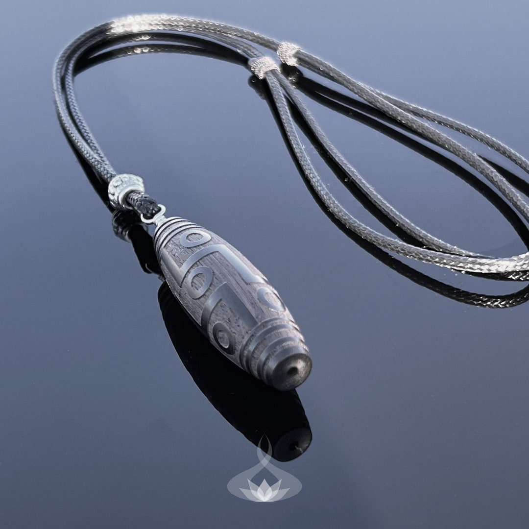 Tibetan Ebony Carved Nine Eye Dzi Bead Protection Necklace | Opens to Place Intention Note ...
