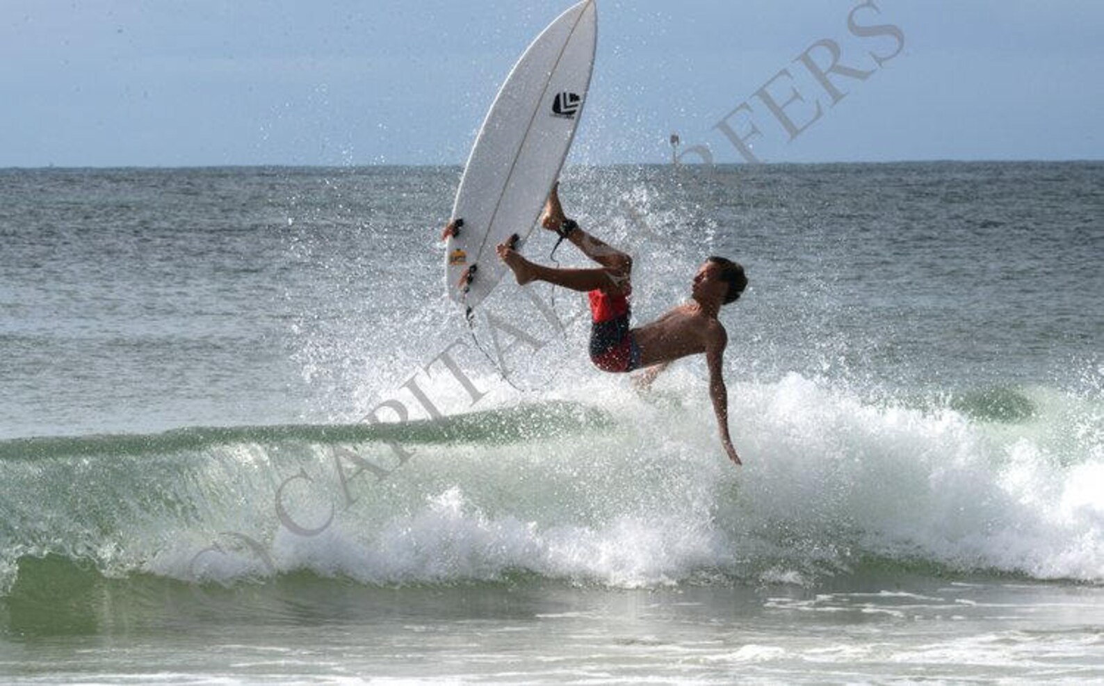Surfer enjoying air time Kings Beach Caloundra, Queensland Stock Image ...