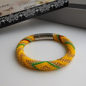 Idde De Orula Con Detalles De Oshun Ololodi Orula Oshun Beads Oshun ...