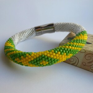 Idde De Orula Con Detalles De Obatala Beads Jewelry Obatala Bracelet ...