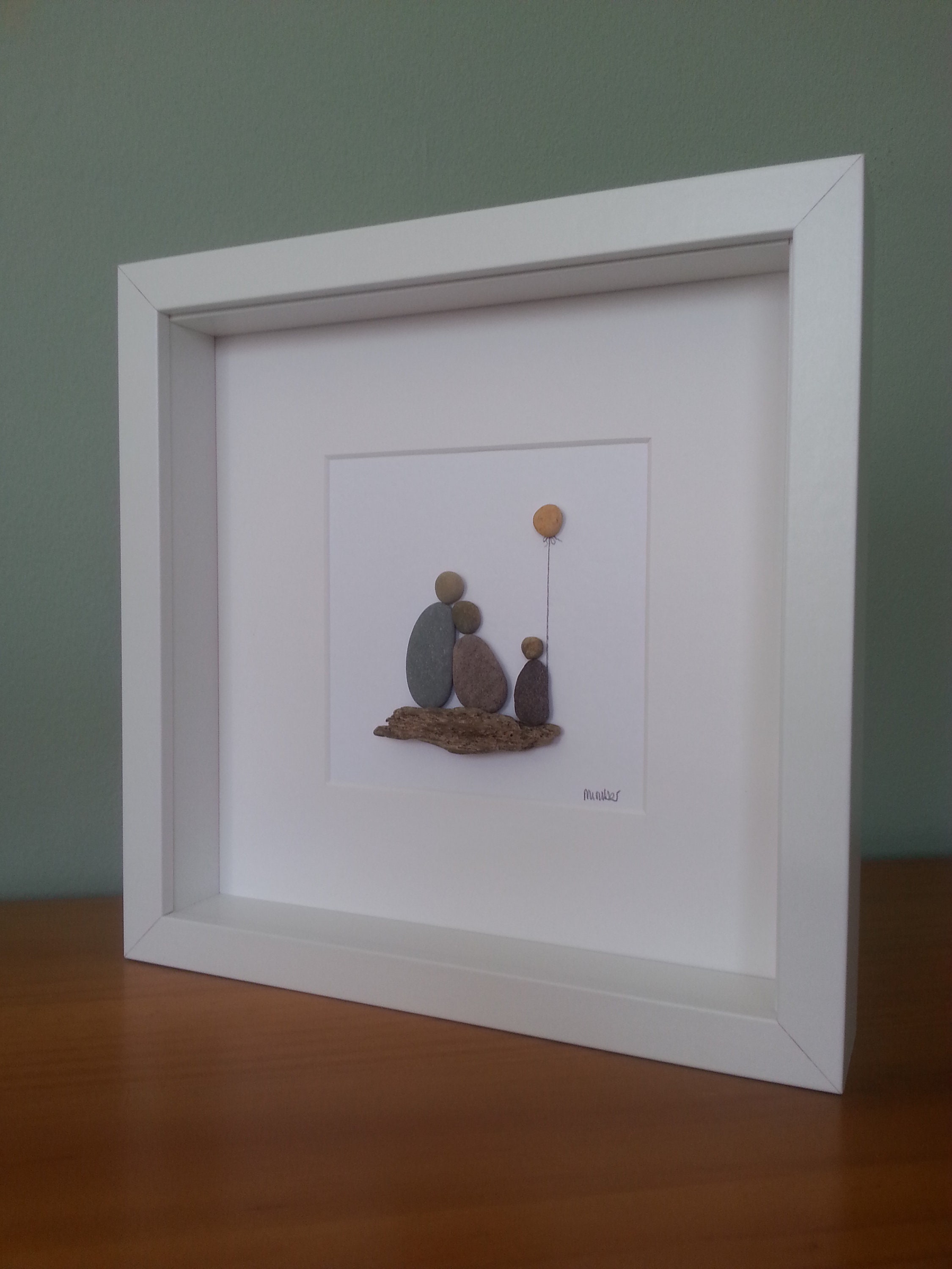 Pebble family of three Pebble people Framed pebble art | Etsy