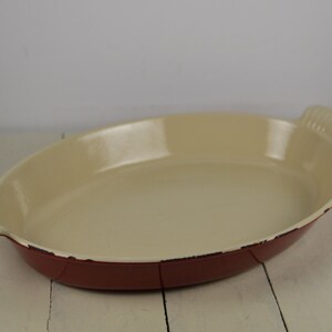 Le Creuset 32 Red Cast Iron Oval Casserole With Handles 14.75", Beige ...