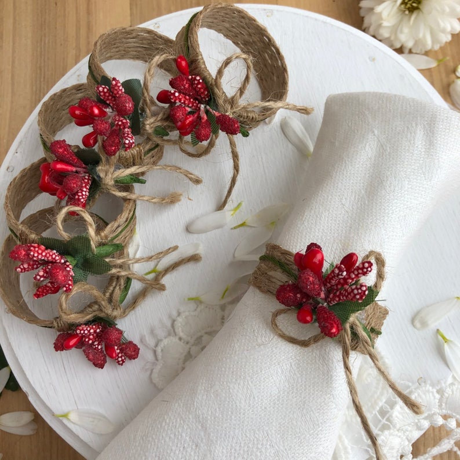 Red rustic jute napkin rings with colorful floral decorations | Etsy