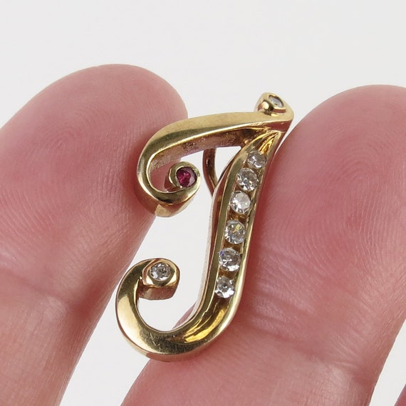 Stylish flowing letter " T " 14k gold diamond journey… - Gem