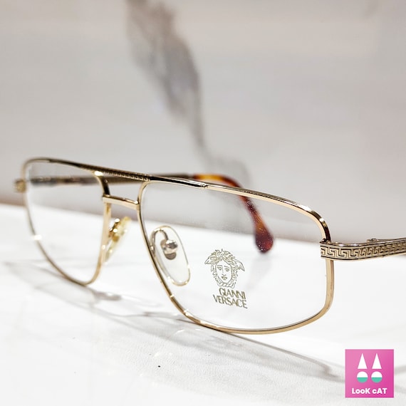 Versace G 64 vintage eyeglasses Gold color frame occh… - Gem