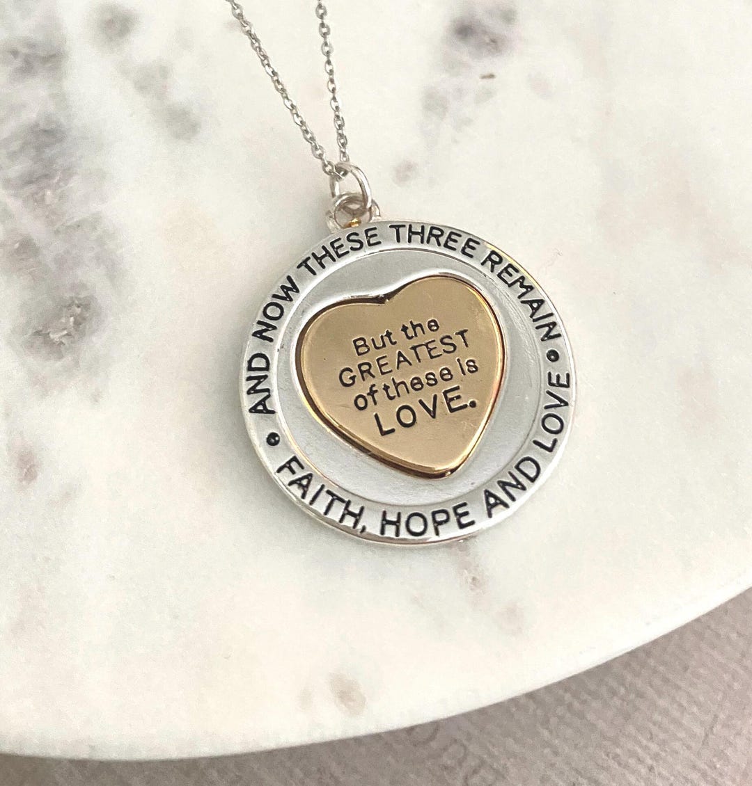 But the Greatest of These is Love Bible Verse Spinner Necklace ...