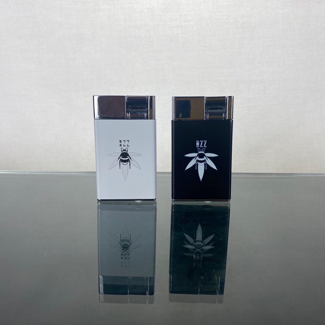 Bzz Refillable Butane Lighter - Glow in the Dark (white), Slick, Sleek ...