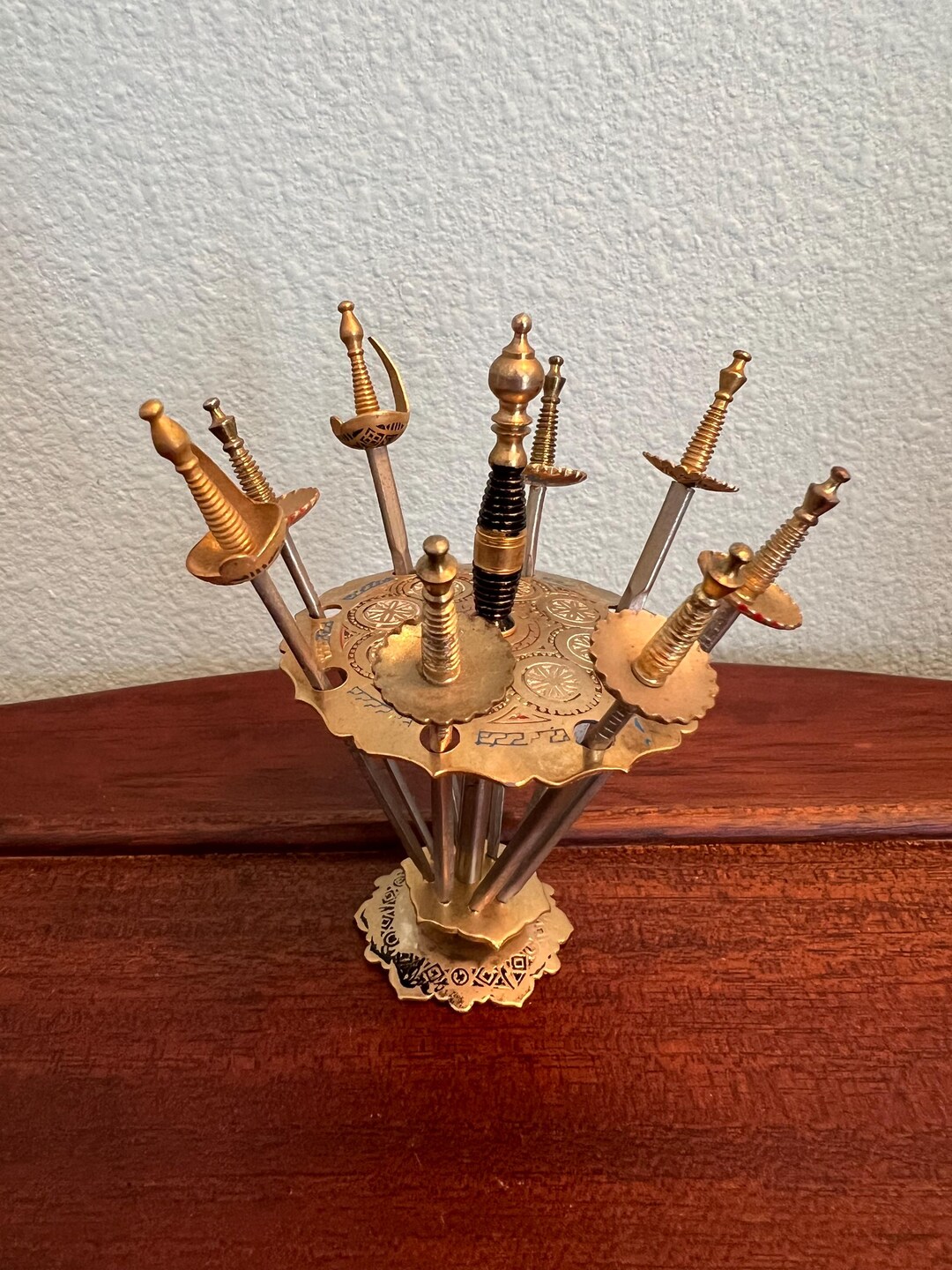 Vintage Brass Eight Toledo Cocktail Swords in A Enamel Decorated Stand ...