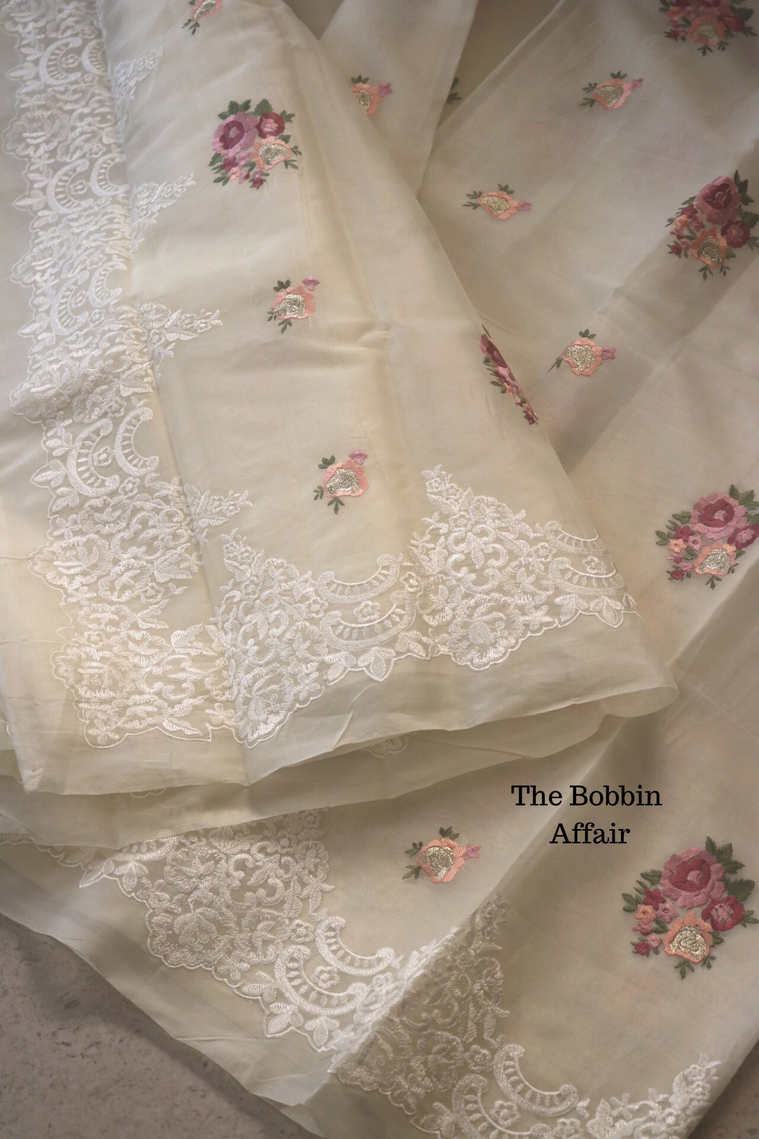 Elegant Saree in Cream Organza With Floral Embroidery and Fringe ...