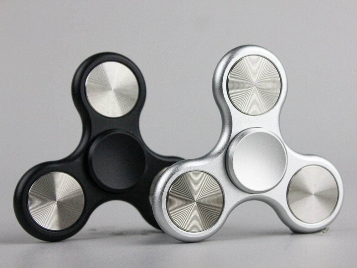 The Classic Fidget Spinner Tri Shape Silver or Black Hand - Etsy
